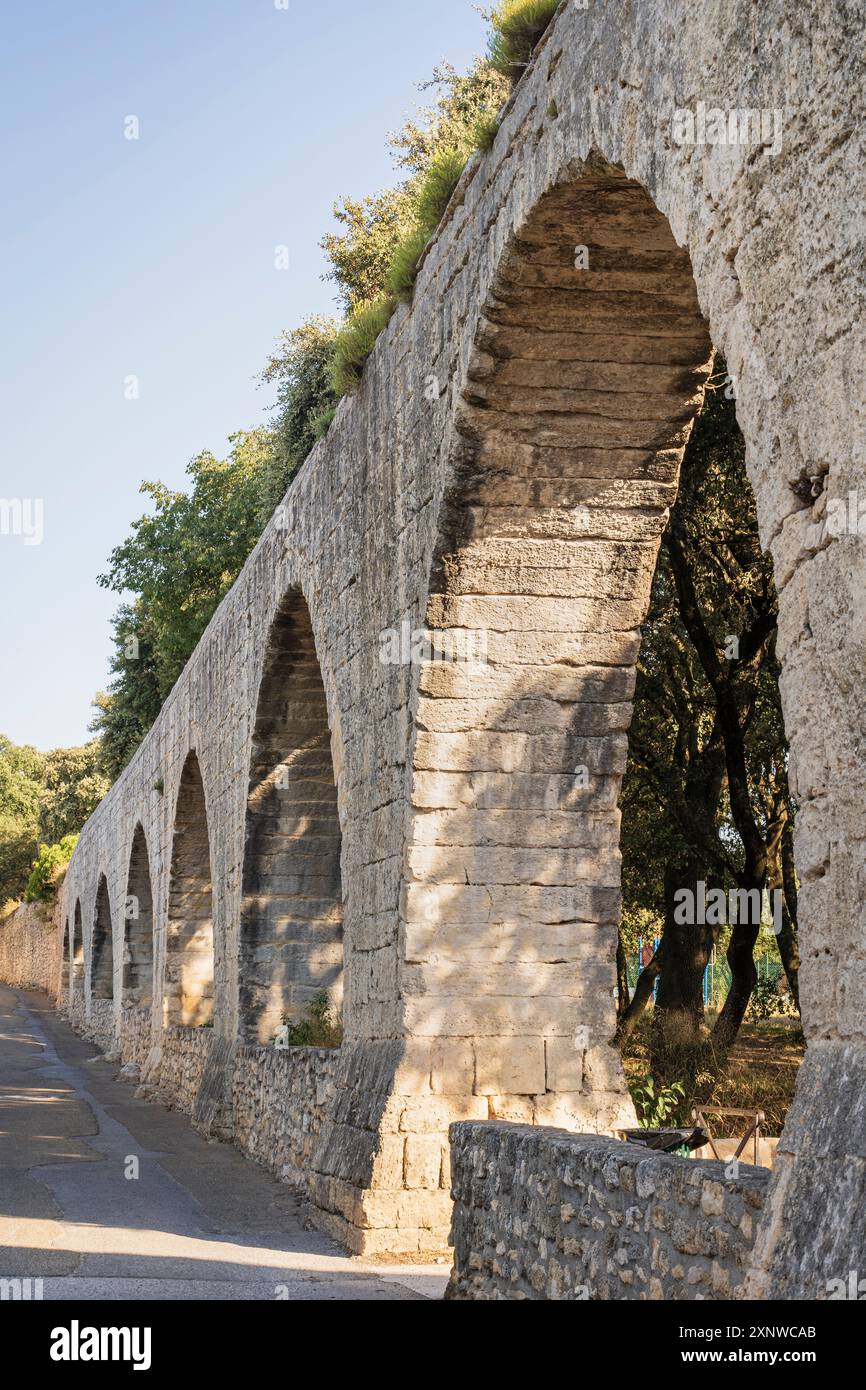 Vertical summer landscape view of ancient stone aqueduct, famous ...