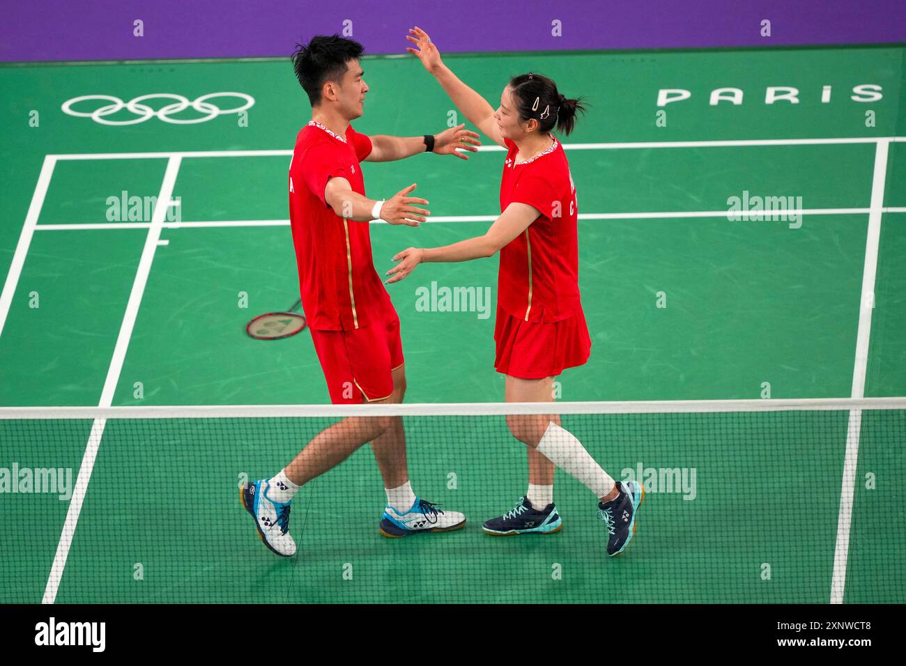 China's Zheng Si Wei, left, and Huang Ya Qiong celebrate after defeating South Korea's Kim Won ...
