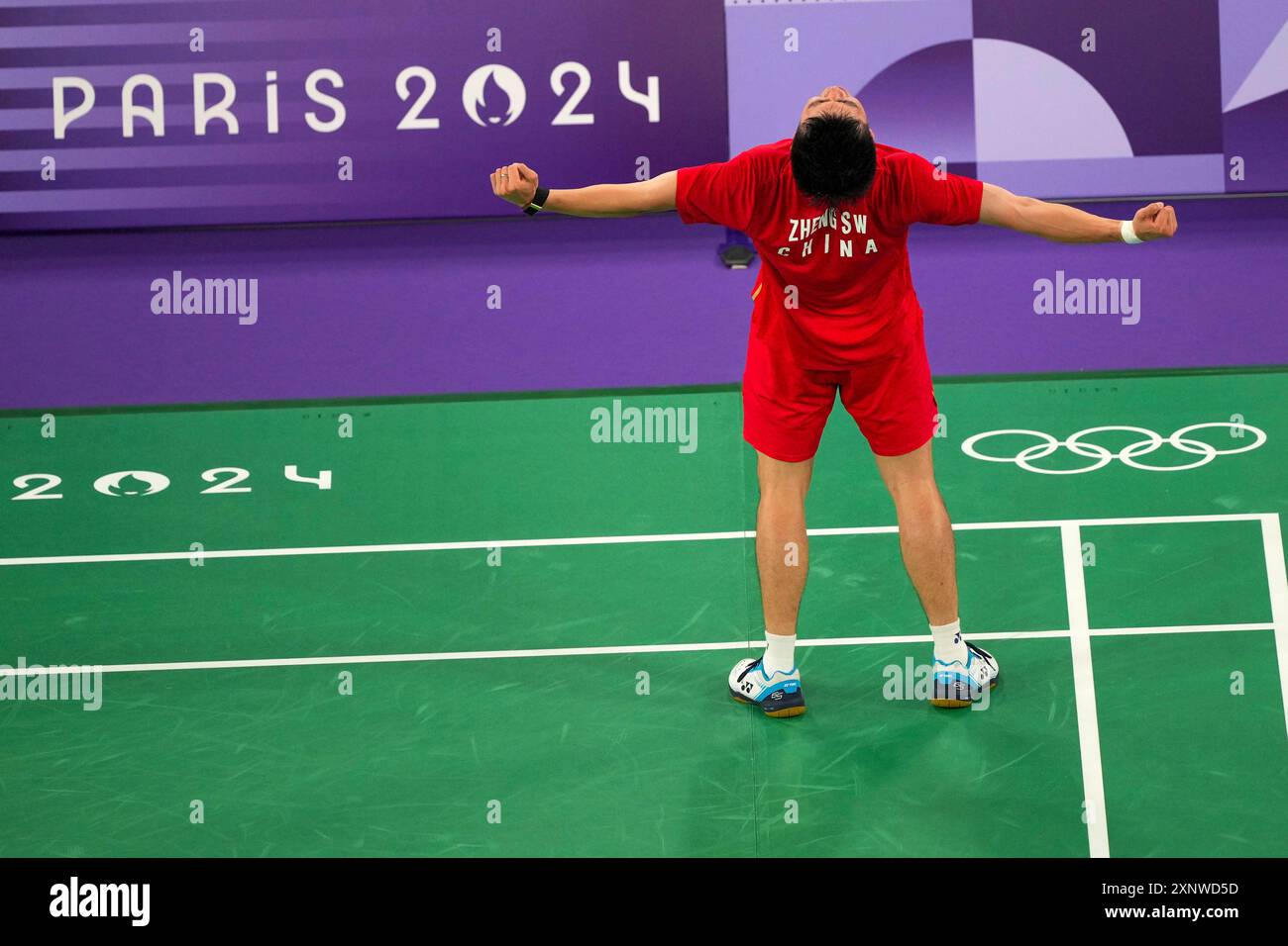 China's Zheng Si Wei celebrates with teammate Huang Ya Qiong after ...
