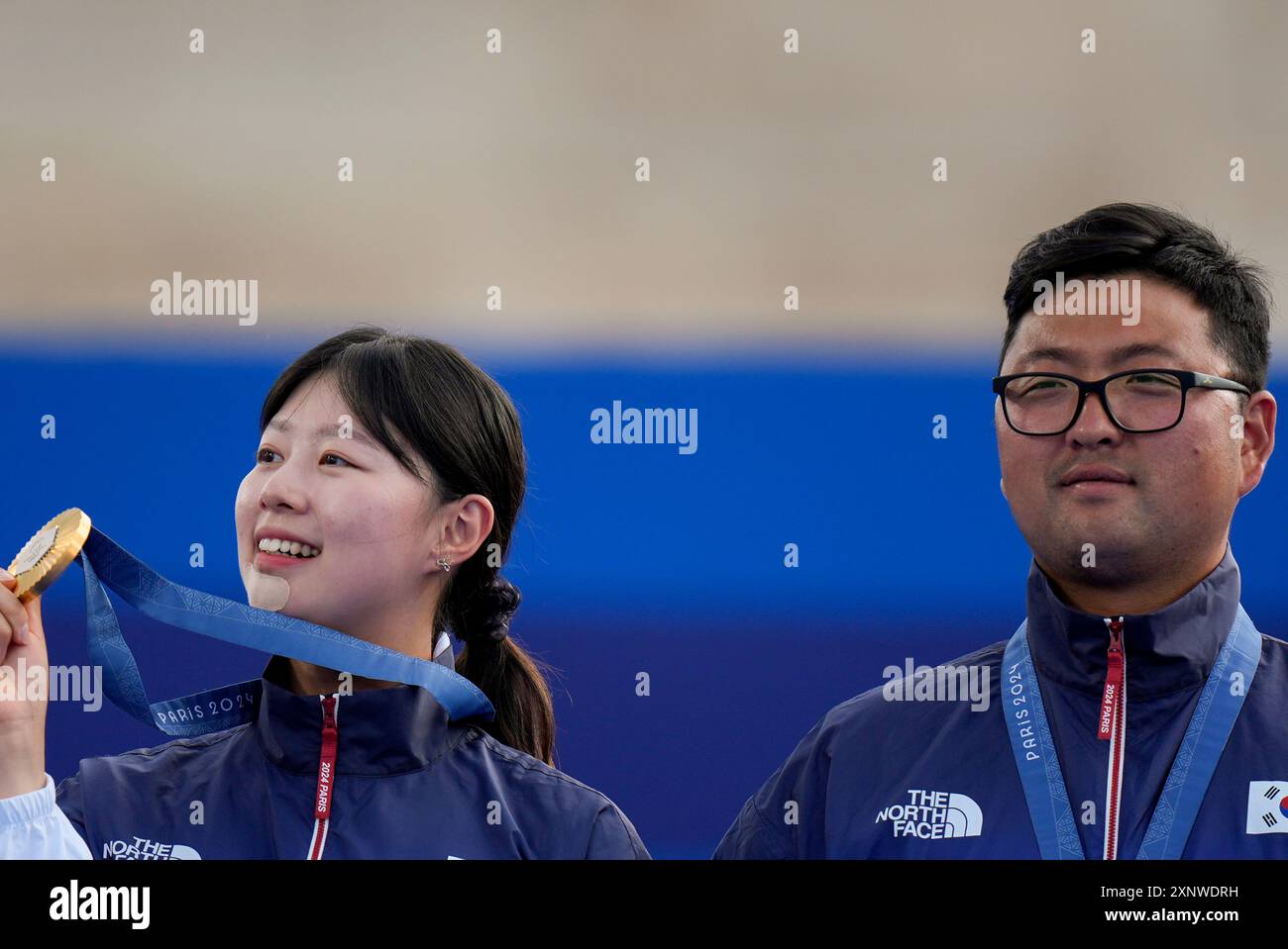 South Korea's Lim Sihyeon holds the gold medal after winning, along ...