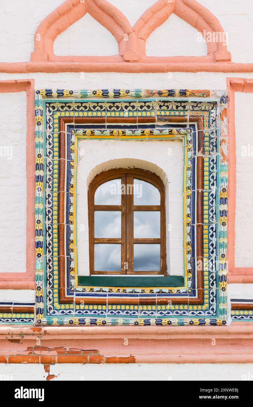 Ancient decorated wall with arched window, background photo texture ...