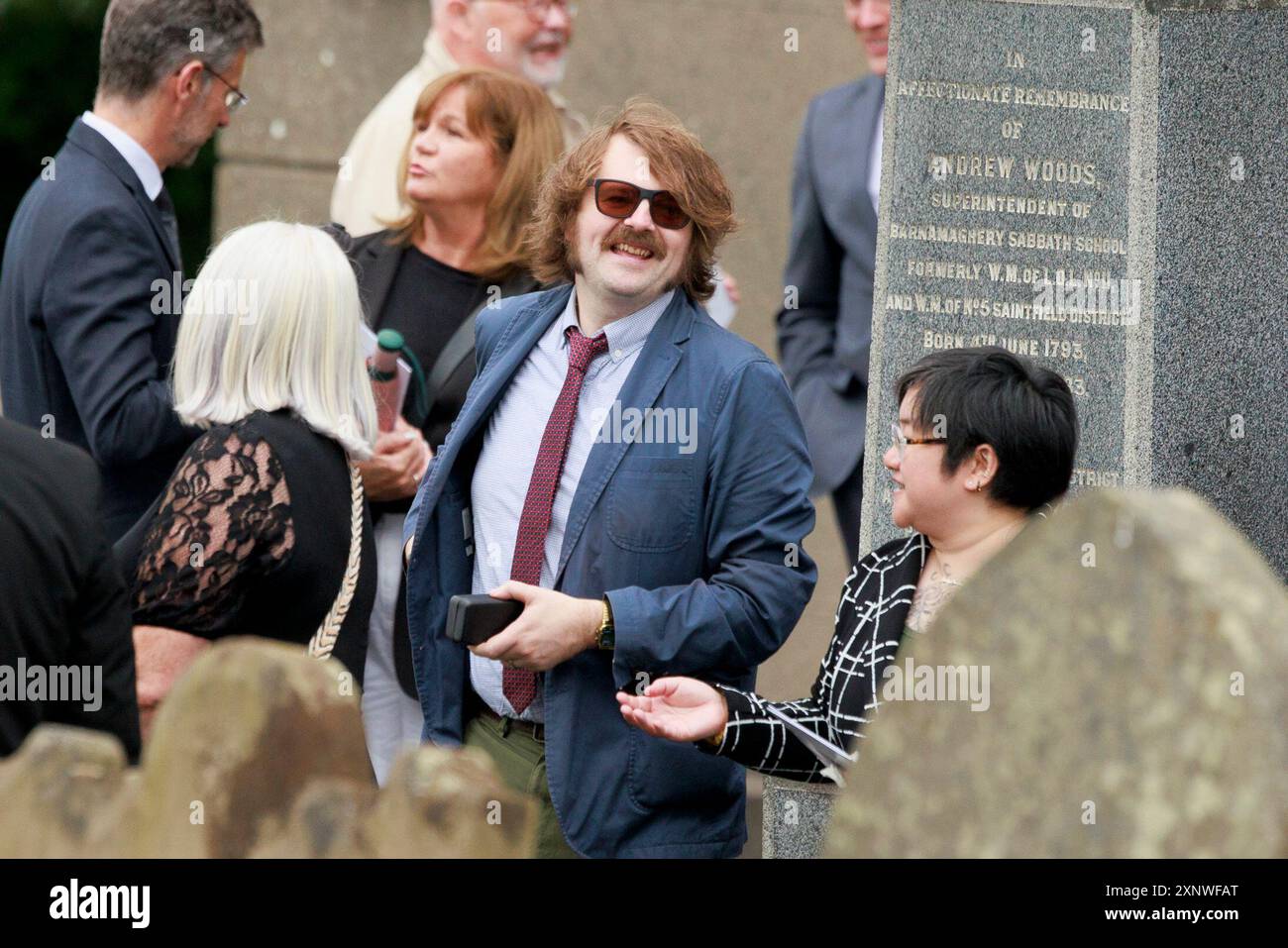 BBC Radio Ulster presenter Steven Rainey (centre) at Trinity ...