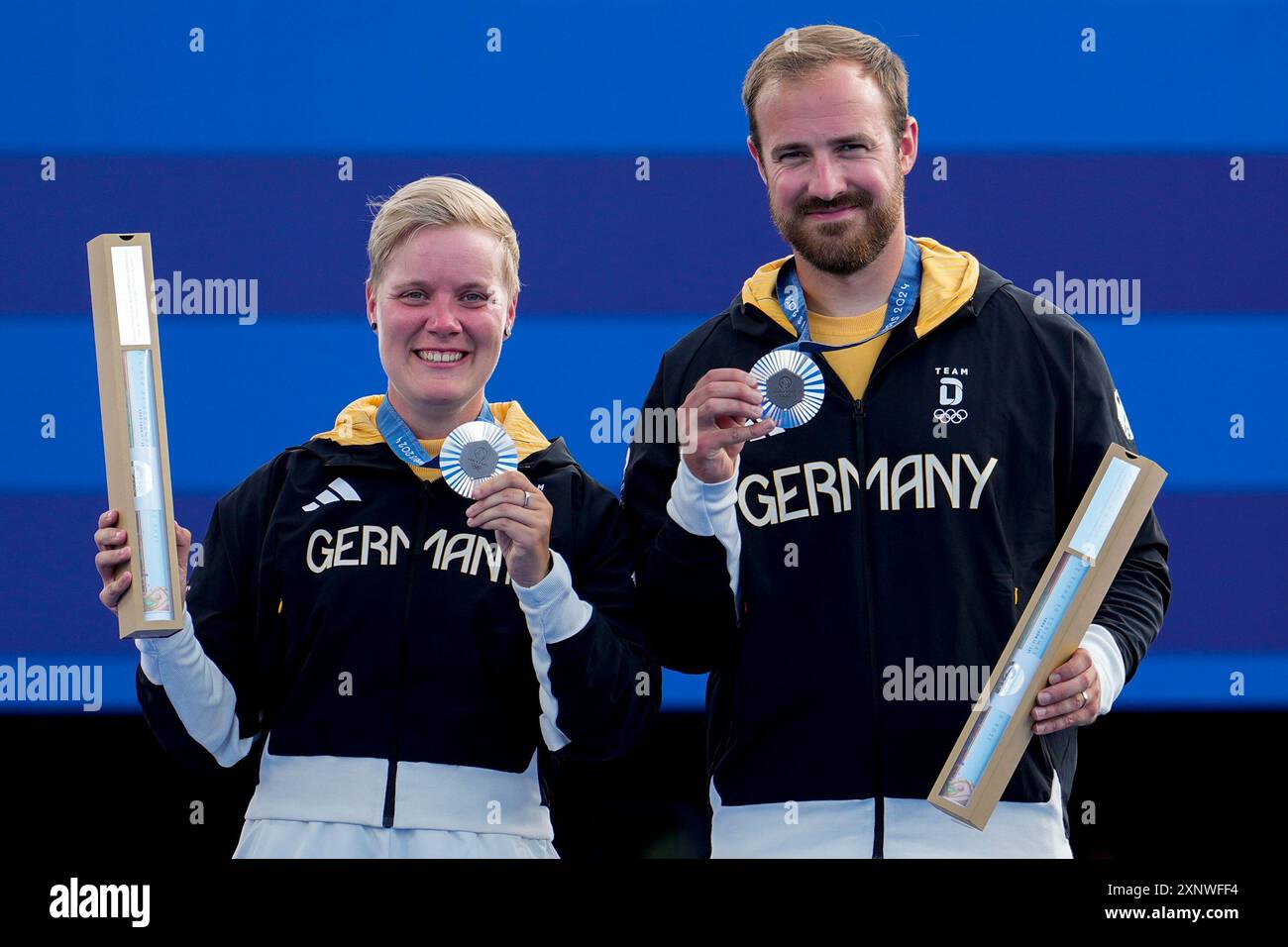 Silver winners Germany's Michelle Kroppen and Florian Unruh pose with ...