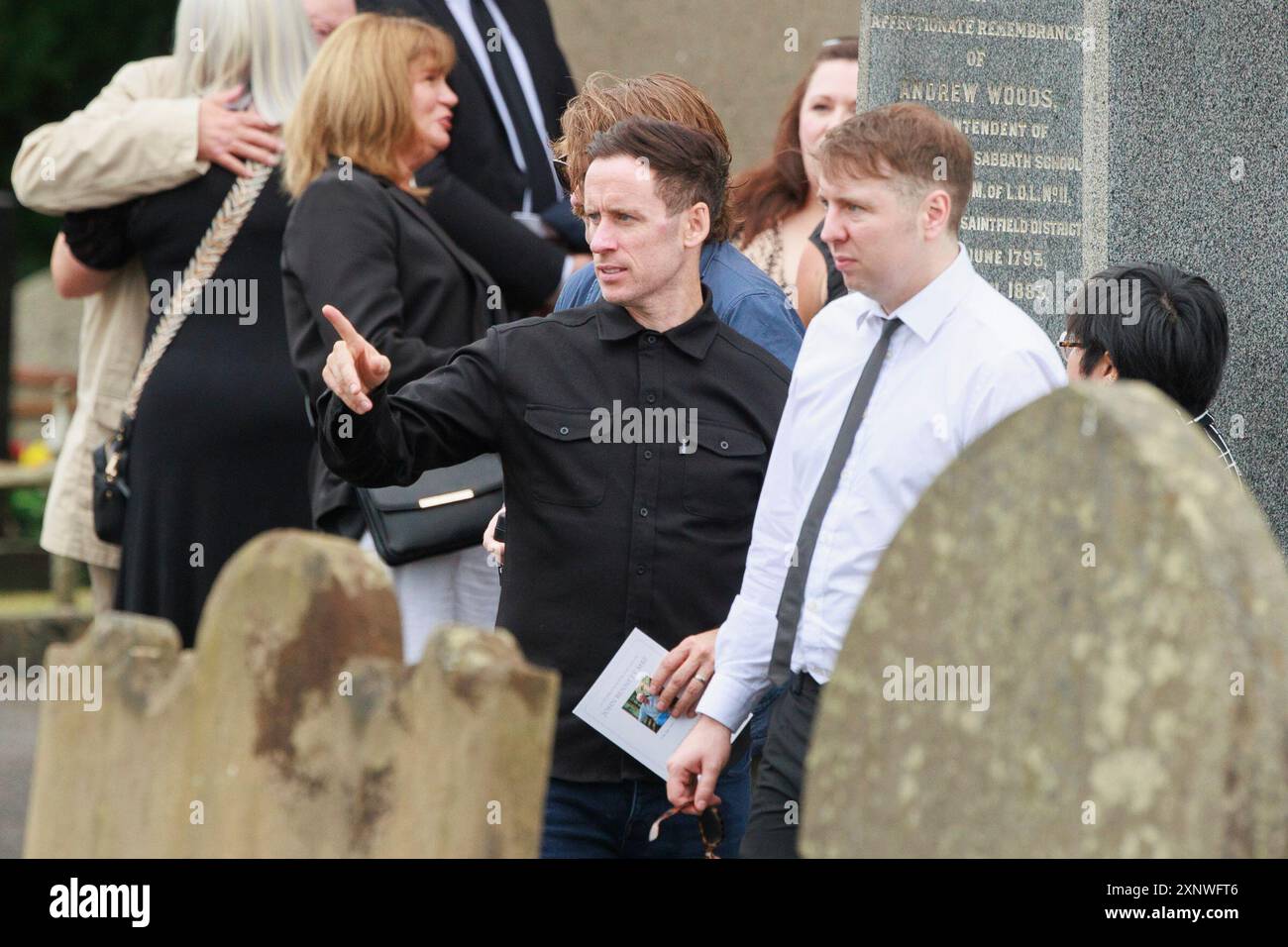 BBC Radio Ulster presenter Connor Phillips (centre left) at Trinity ...