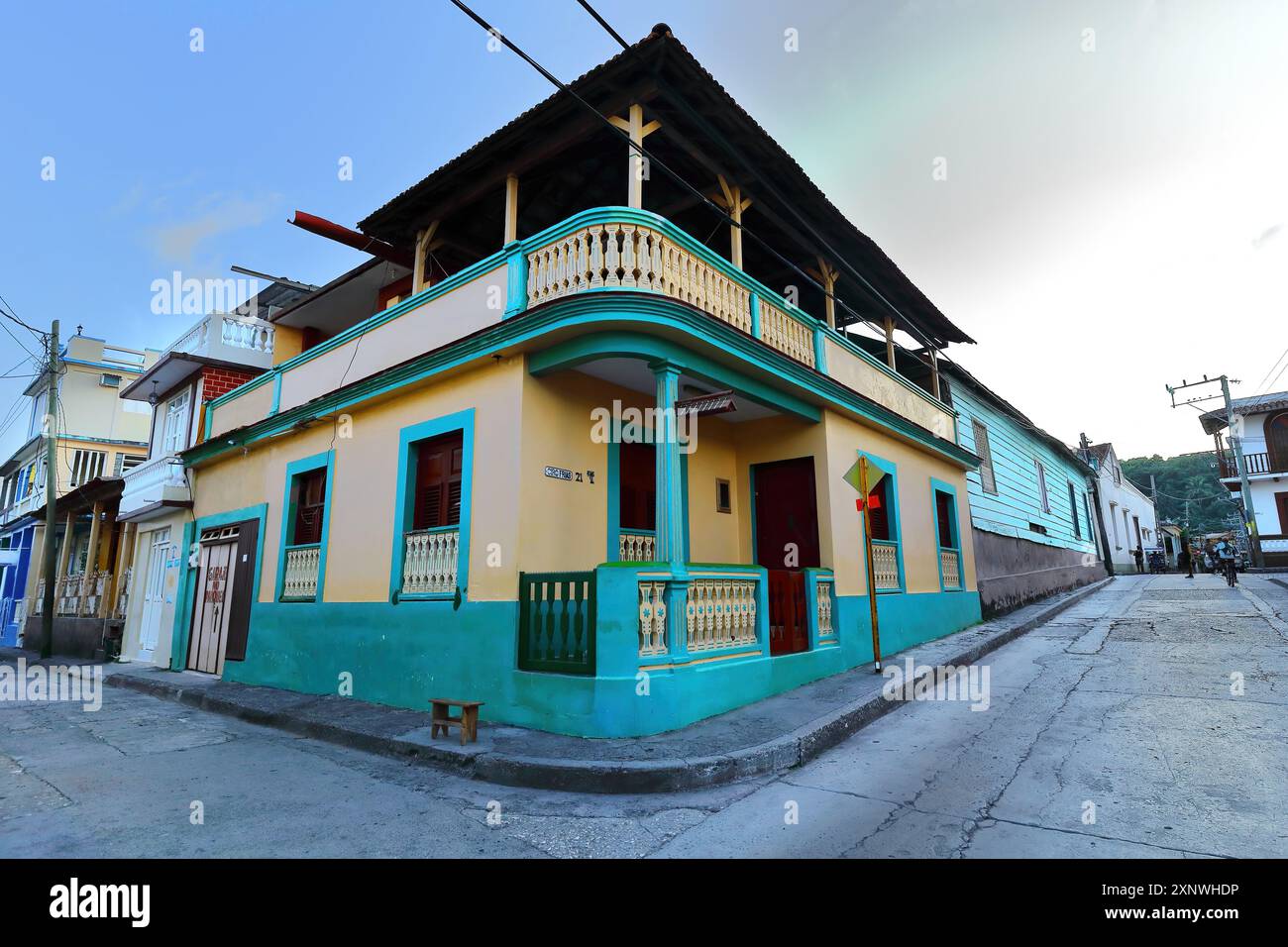 562 Eclectic building from the early 1900s painted mint-green and peach ...