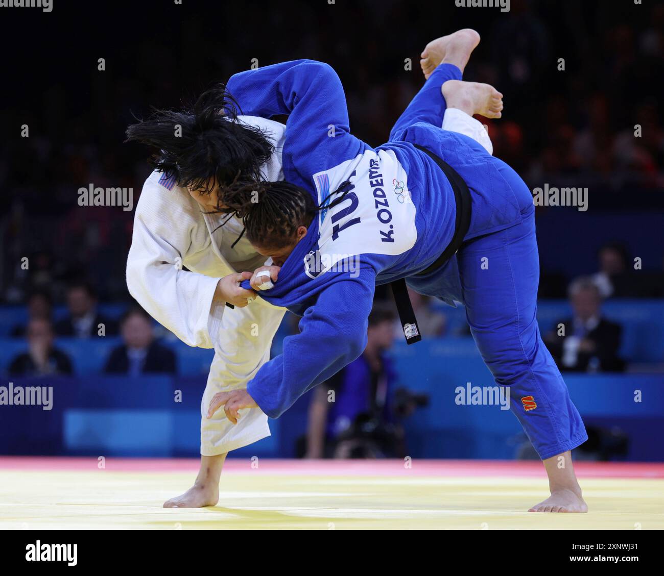 KIM Hayun of Korea(white) and OZDEMIR Kayra of Turkey(blue) compete ...