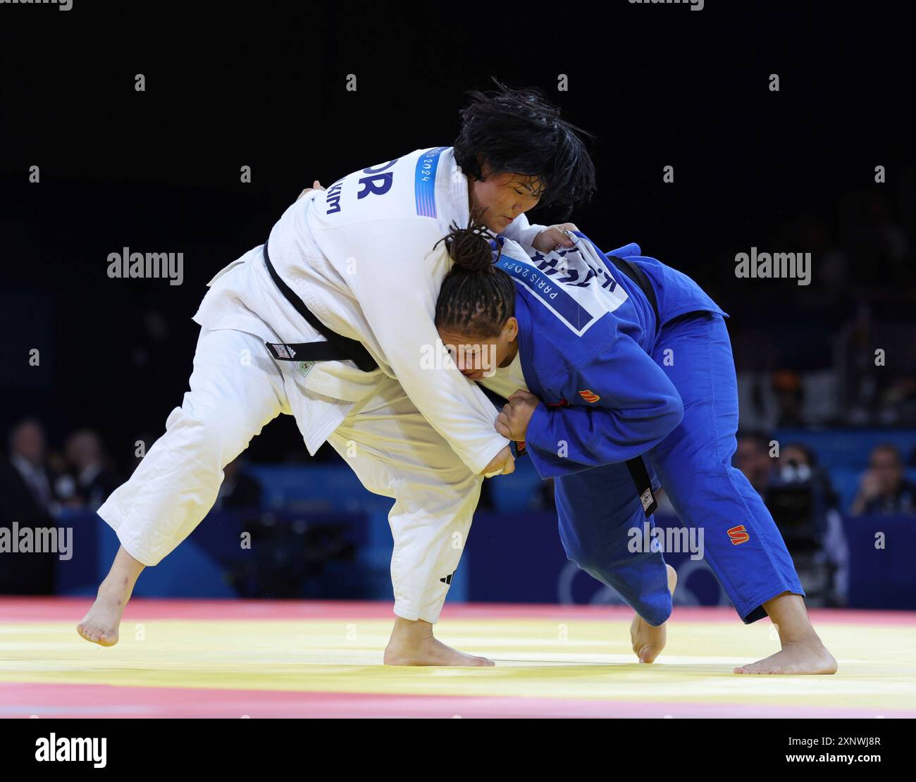 KIM Hayun of Korea(white) and OZDEMIR Kayra of Turkey(blue) compete during the women's Judo +78 ...