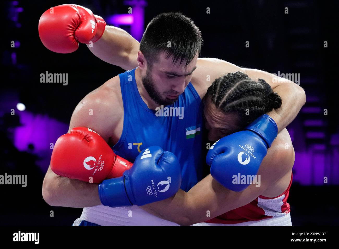 Australia's Teremoana Teremoana, right, fights Uzbekistan's Bakhodir ...