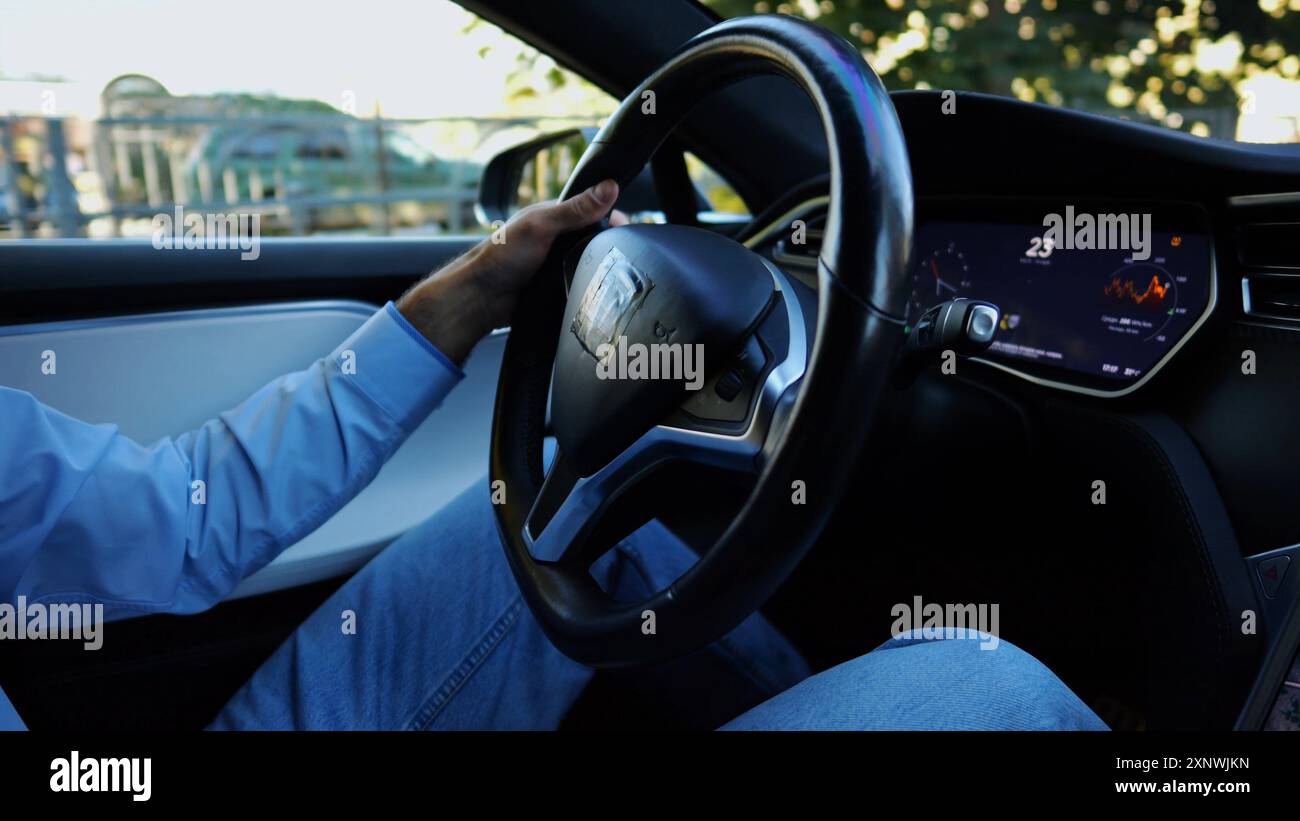 Man holds on driving inside hi-res stock photography and images - Alamy