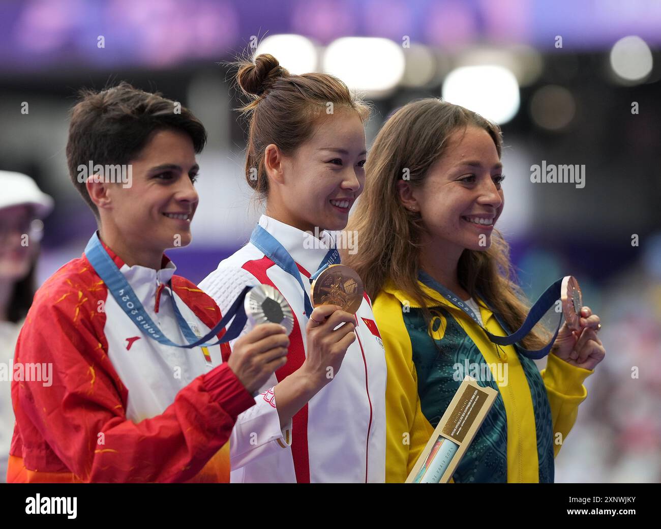 Paris, France. 2nd Aug, 2024. Gold medalist Yang Jiayu (C) of China ...