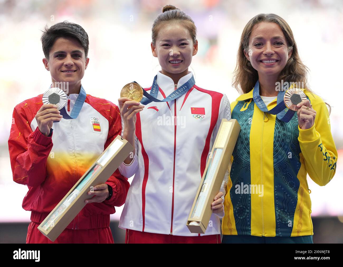 Paris, France. 2nd Aug, 2024. Gold medalist Yang Jiayu (C) of China ...