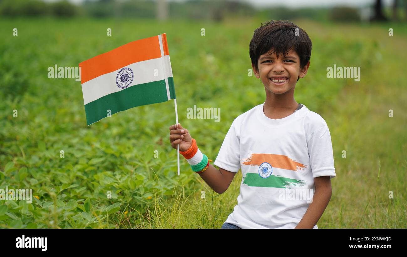Handsome cute little Indian boy or kid in white ethnic wear standing ...