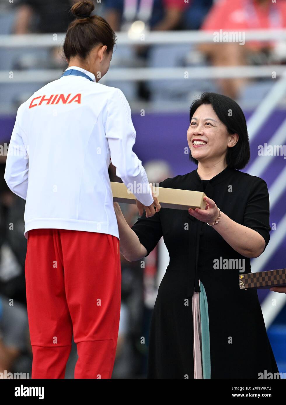 Paris, France. 2nd Aug, 2024. Gold medalist Yang Jiayu (L) of China ...