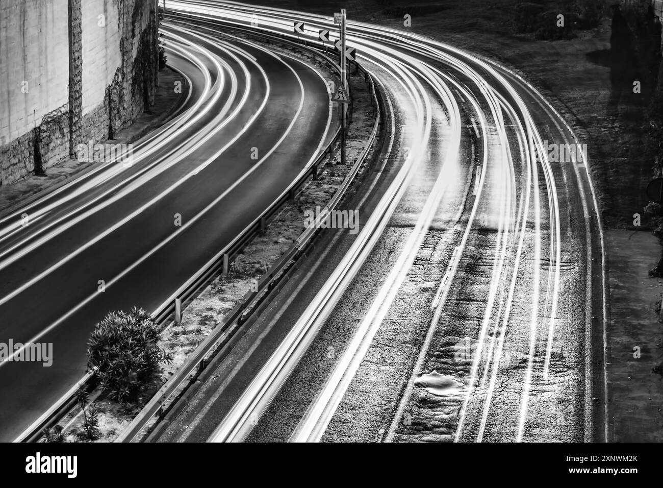 Driving on night road Black and White Stock Photos & Images - Alamy