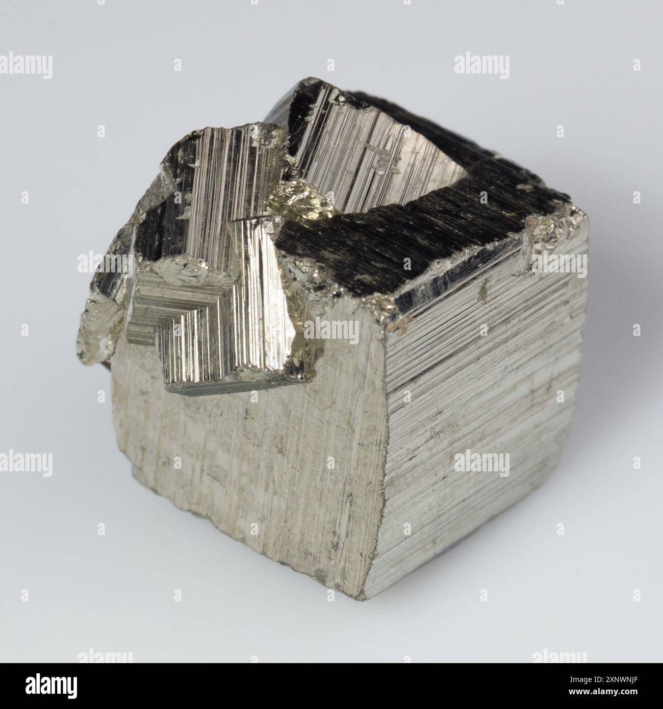natural silver pyrite gem on white background Stock Photo - Alamy