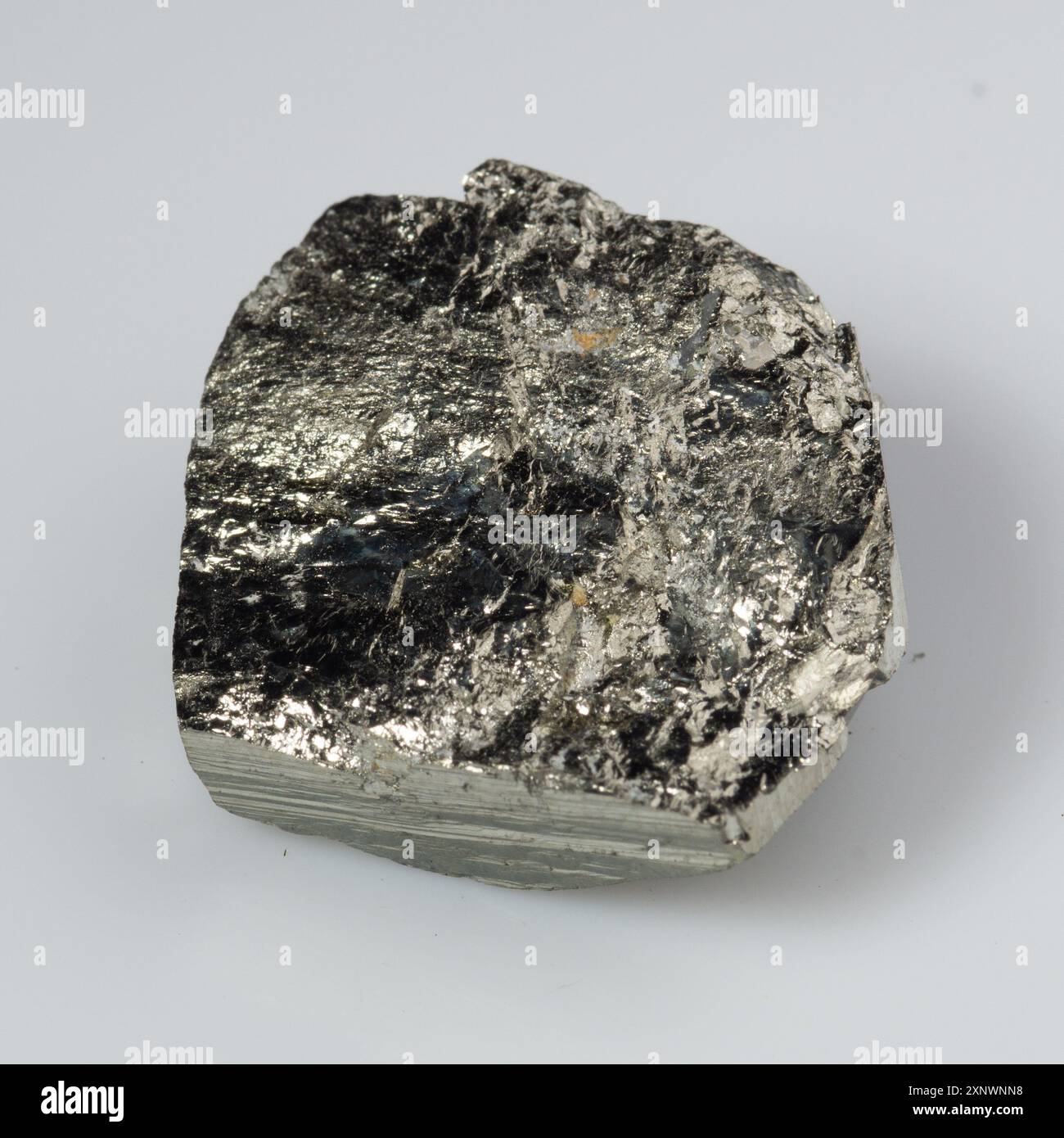 natural silver pyrite gem on white background Stock Photo - Alamy