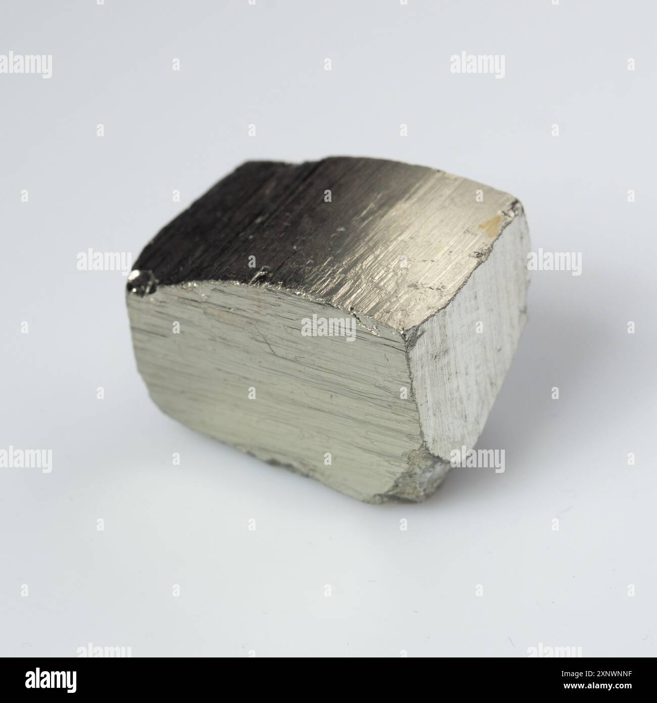 natural silver pyrite gem on white background Stock Photo - Alamy