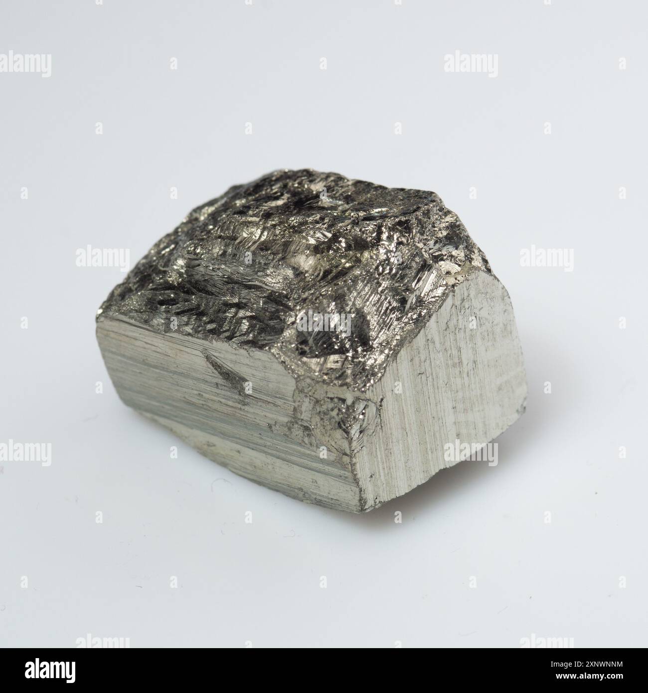 natural silver pyrite gem on white background Stock Photo - Alamy