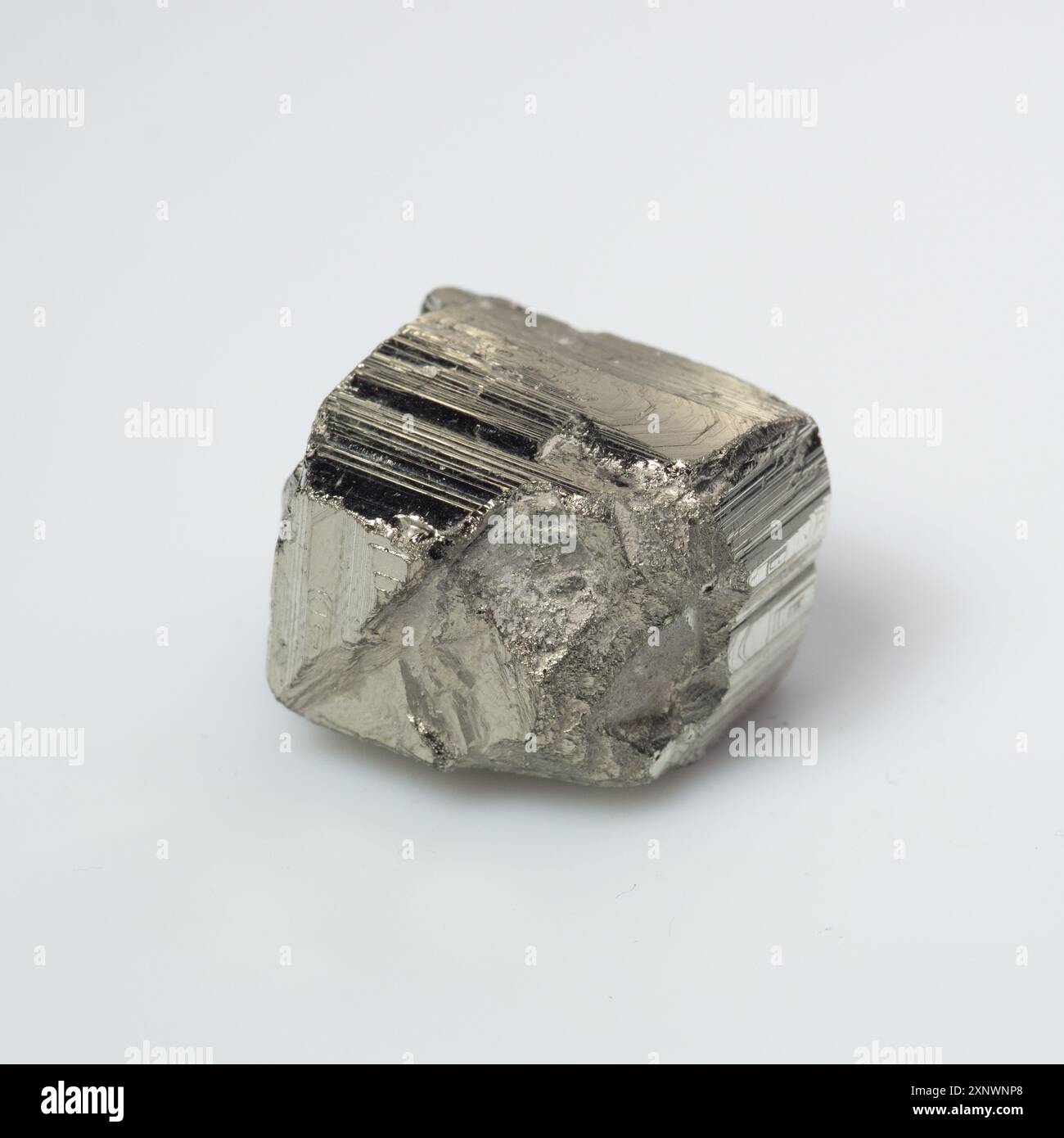 natural silver pyrite gem on white background Stock Photo - Alamy