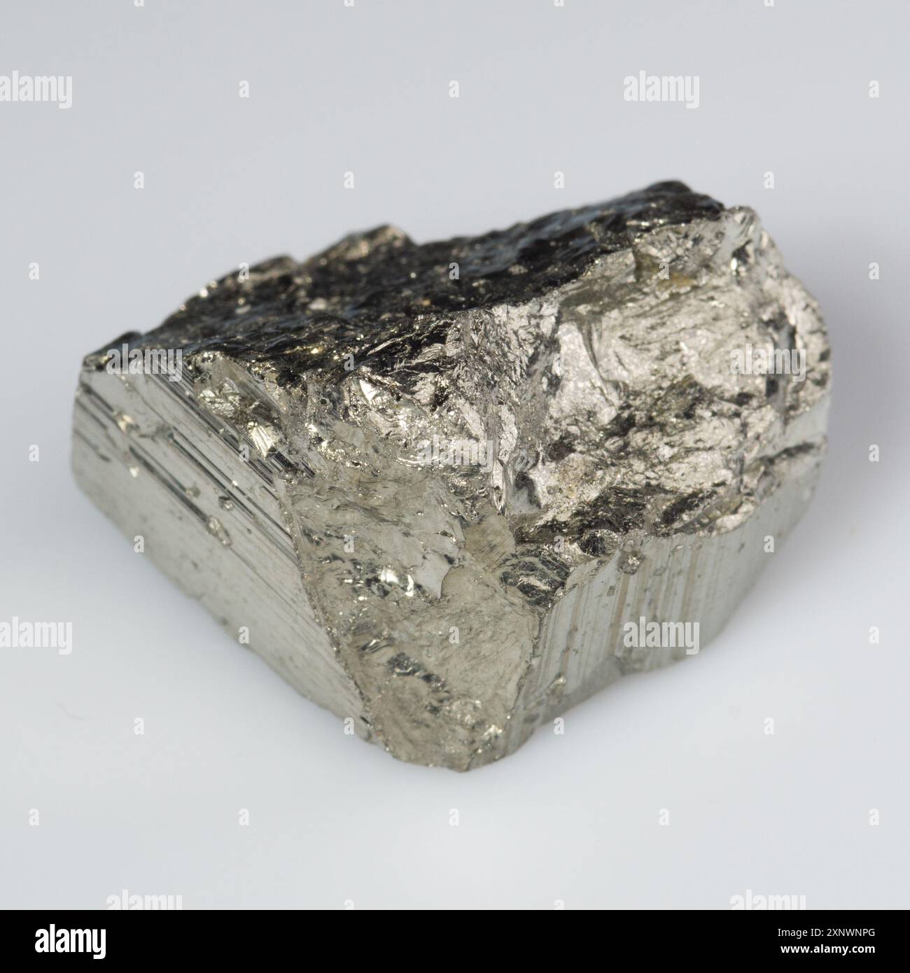 natural silver pyrite gem on white background Stock Photo - Alamy
