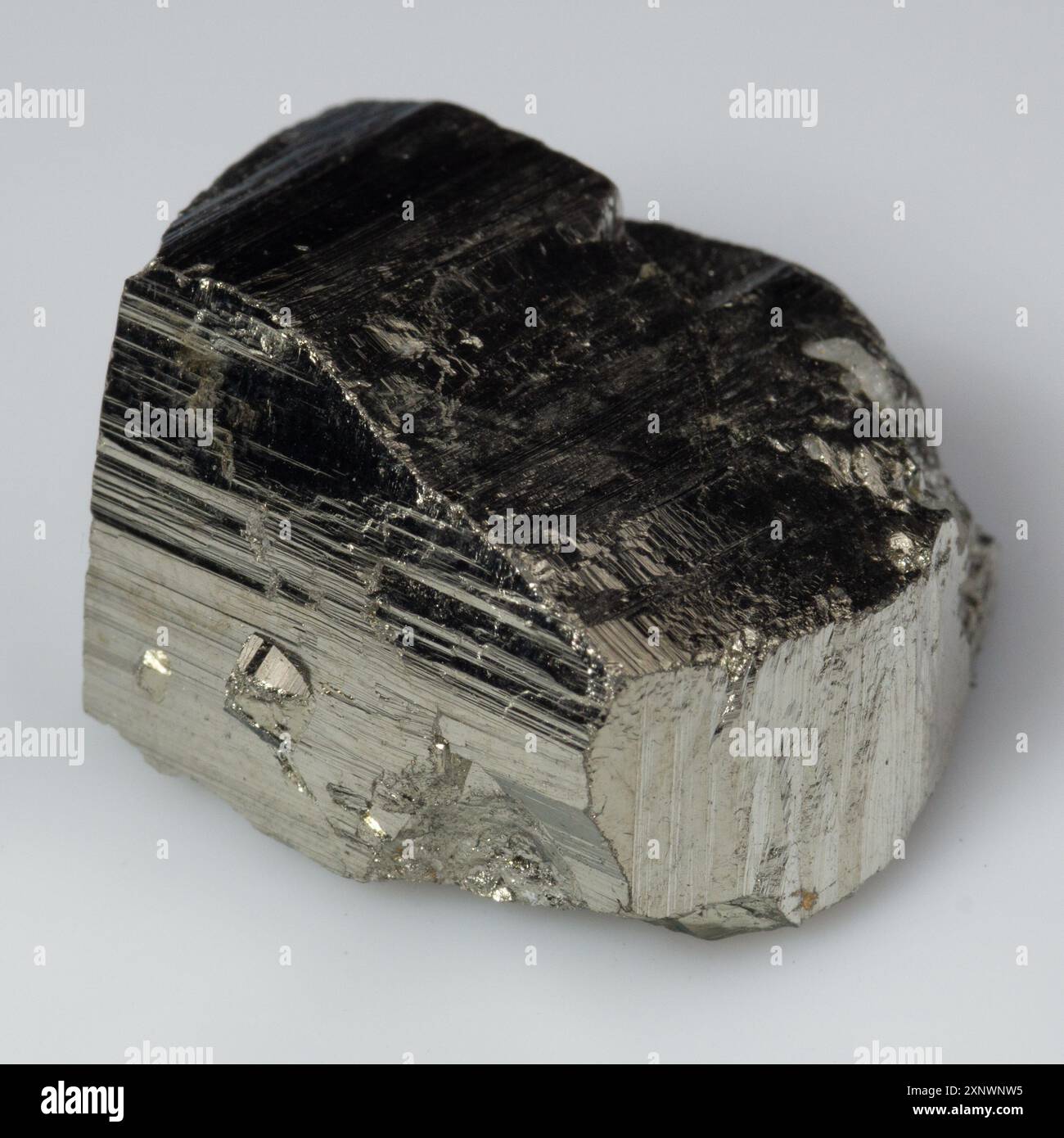 natural silver pyrite gem on white background Stock Photo - Alamy
