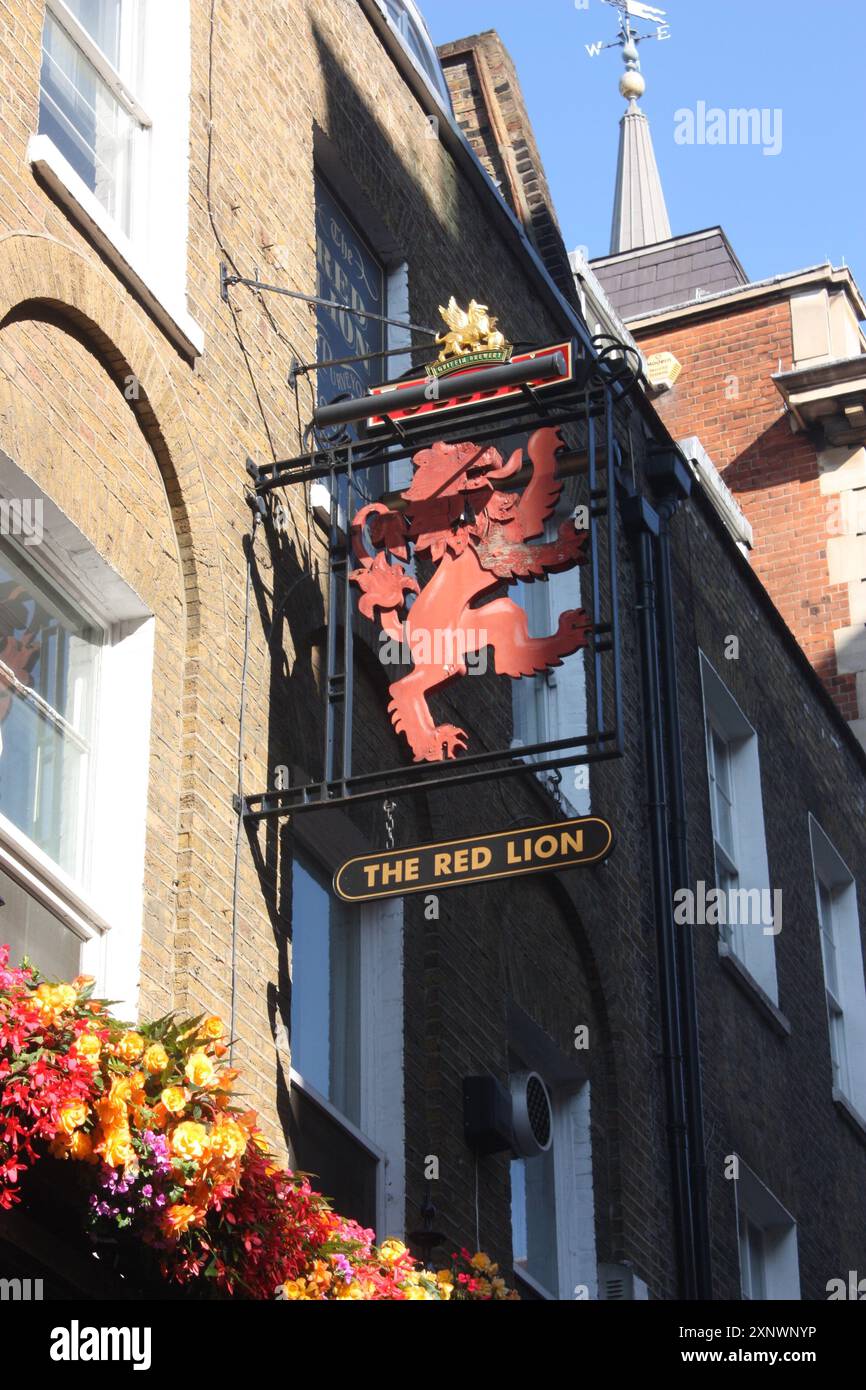 A traditional pub sign on Duke of York Street in central London ...