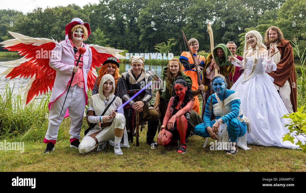 02 August 2024, Brandenburg, Cottbus: People in various costumes take ...