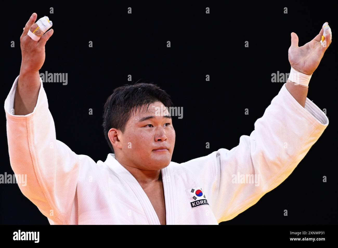 Kim Minjong ( KOR ) celebrates his victory against Tatsuru Saito ( JPN ...