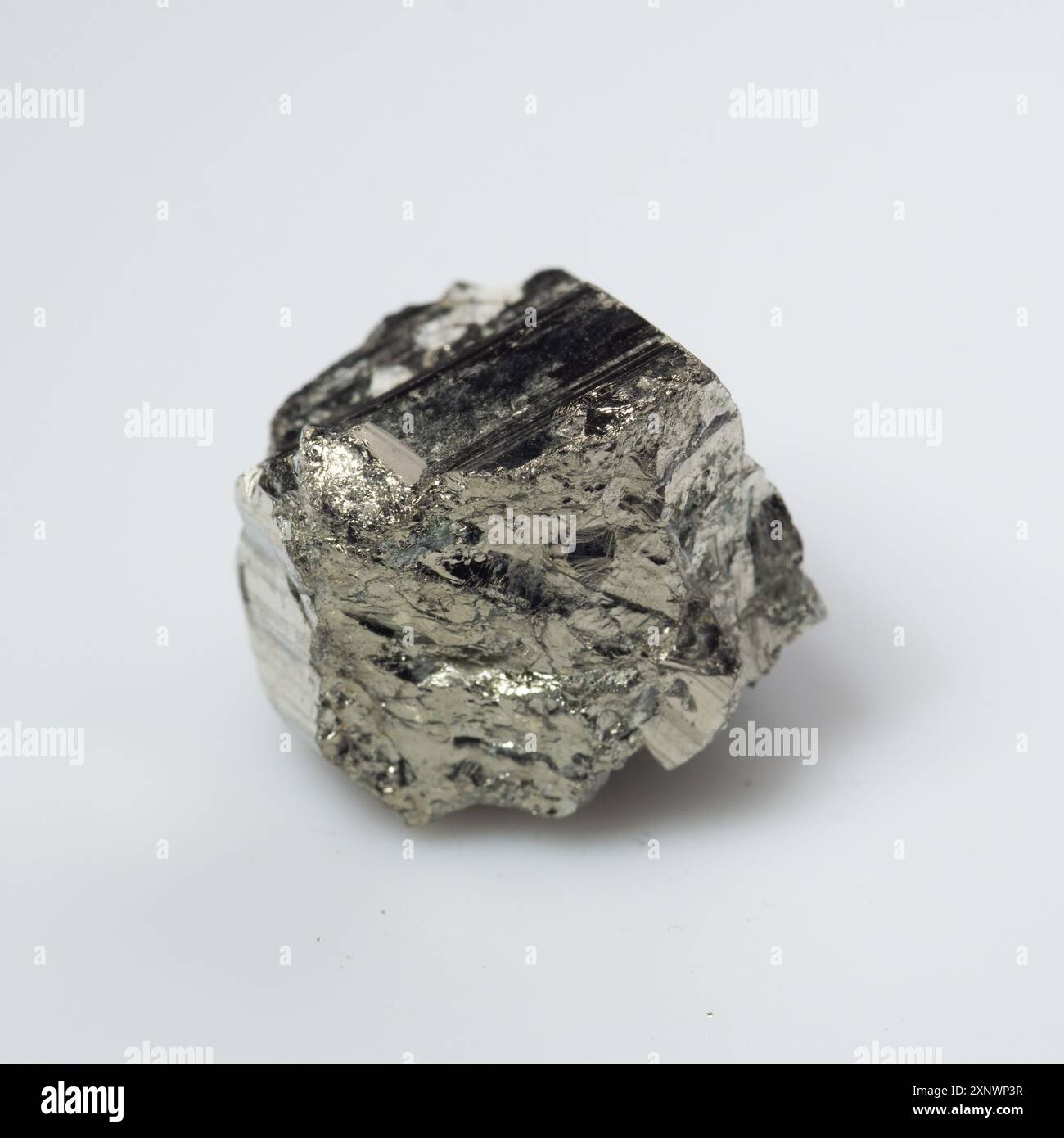 natural silver pyrite gem on white background Stock Photo - Alamy
