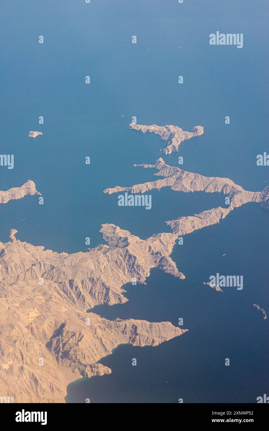 Aerial perspective of the Strait of Hormuz showcasing the rugged ... Aerial perspective of the Strait of Hormuz showcasing the rugged ...