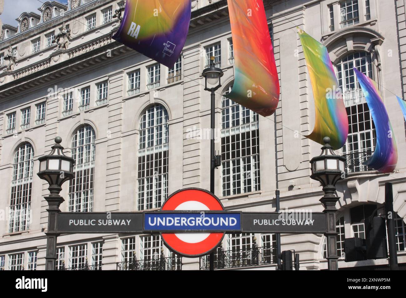 A traditional tube station sign at Piccadilly Circus, central London ...