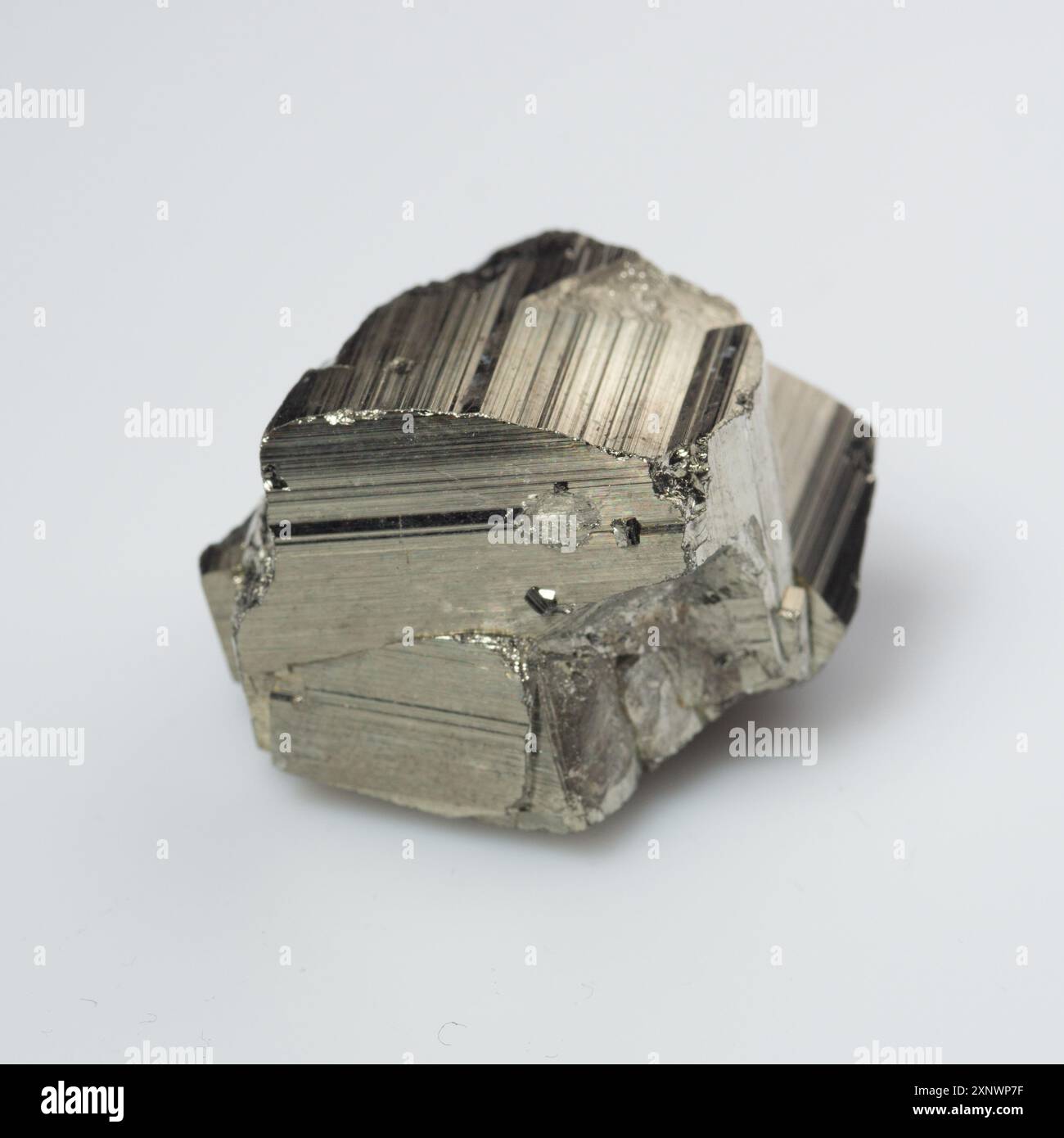 natural silver pyrite gem on white background Stock Photo - Alamy