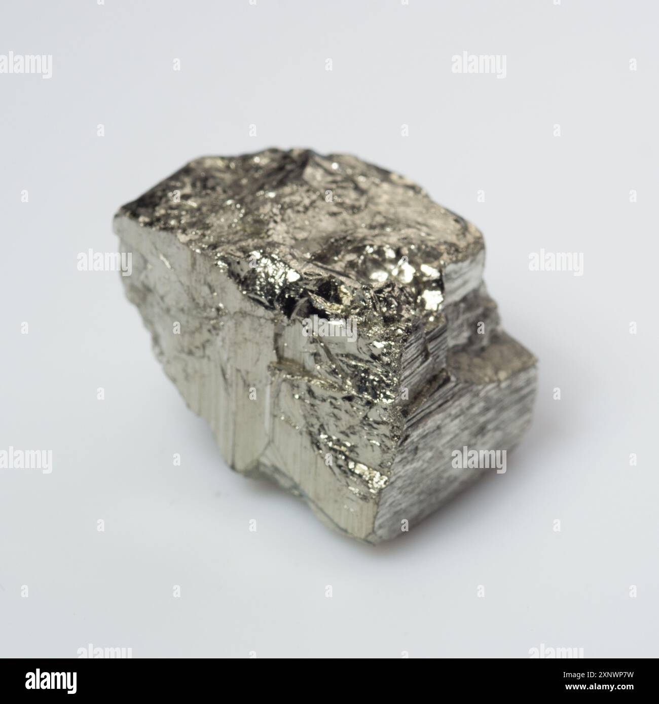 natural silver pyrite gem on white background Stock Photo - Alamy