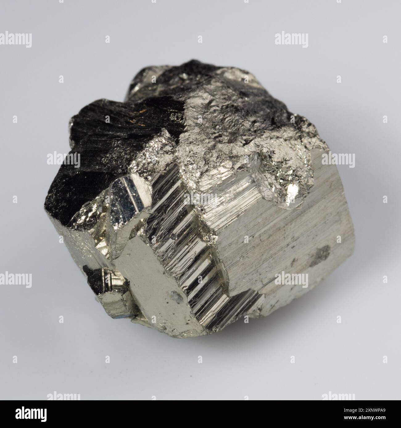 natural silver pyrite gem on white background Stock Photo - Alamy