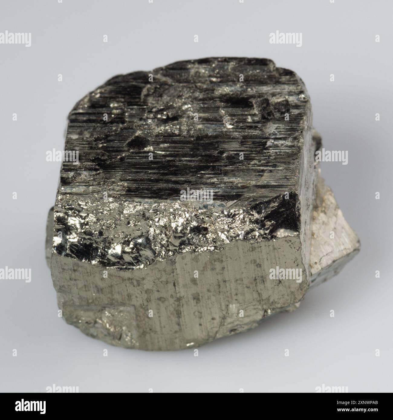 natural silver pyrite gem on white background Stock Photo - Alamy