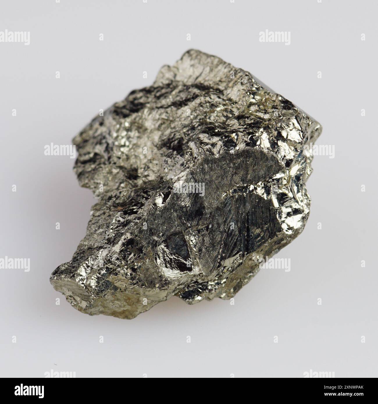natural silver pyrite gem on white background Stock Photo - Alamy