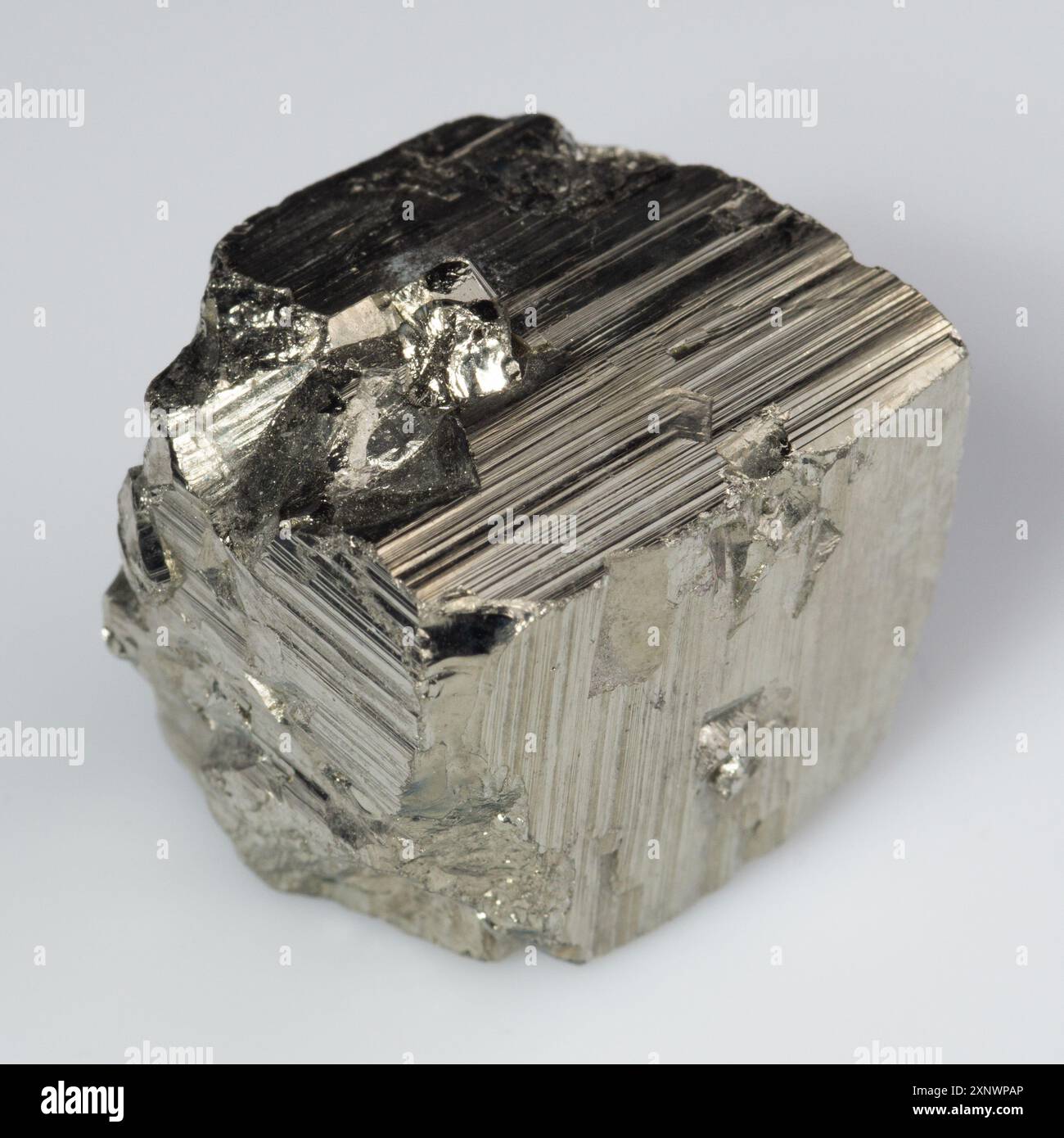natural silver pyrite gem on white background Stock Photo - Alamy