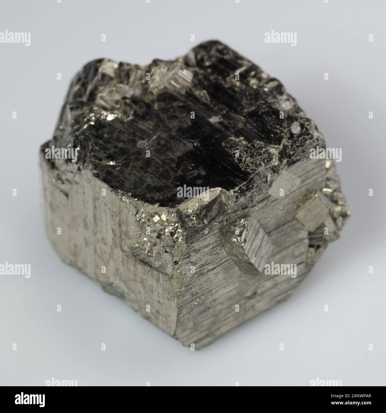 natural silver pyrite gem on white background Stock Photo - Alamy