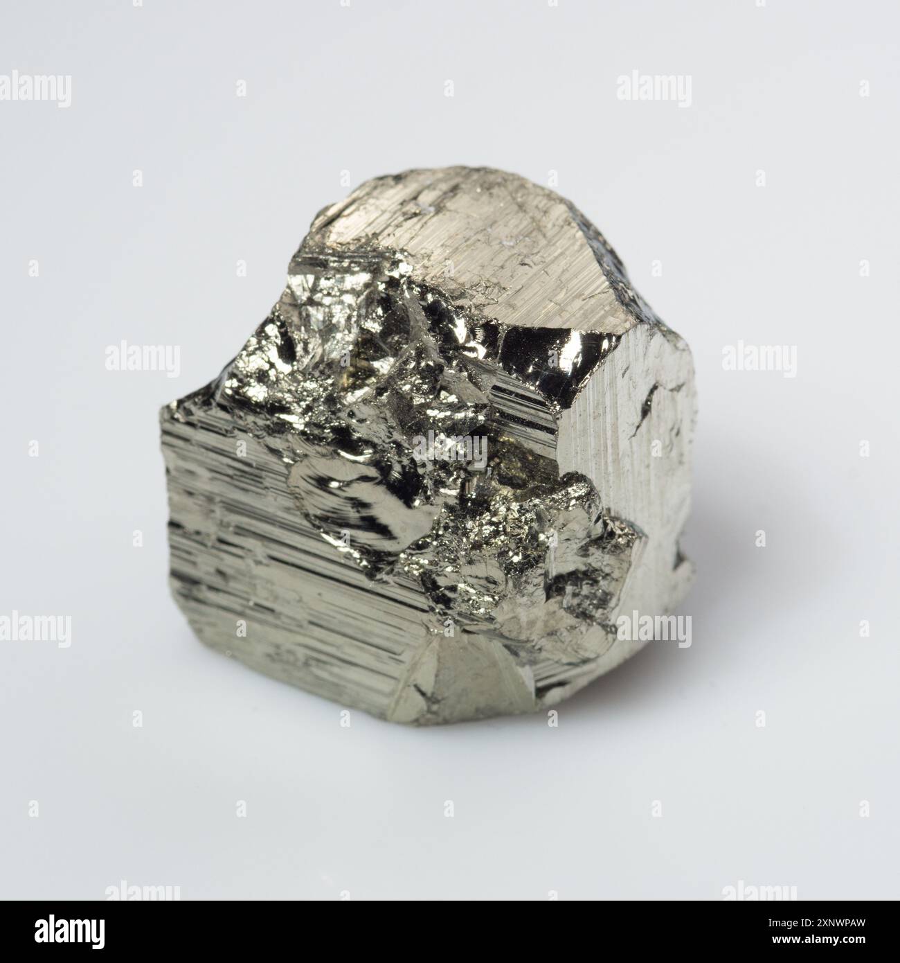 natural silver pyrite gem on white background Stock Photo - Alamy