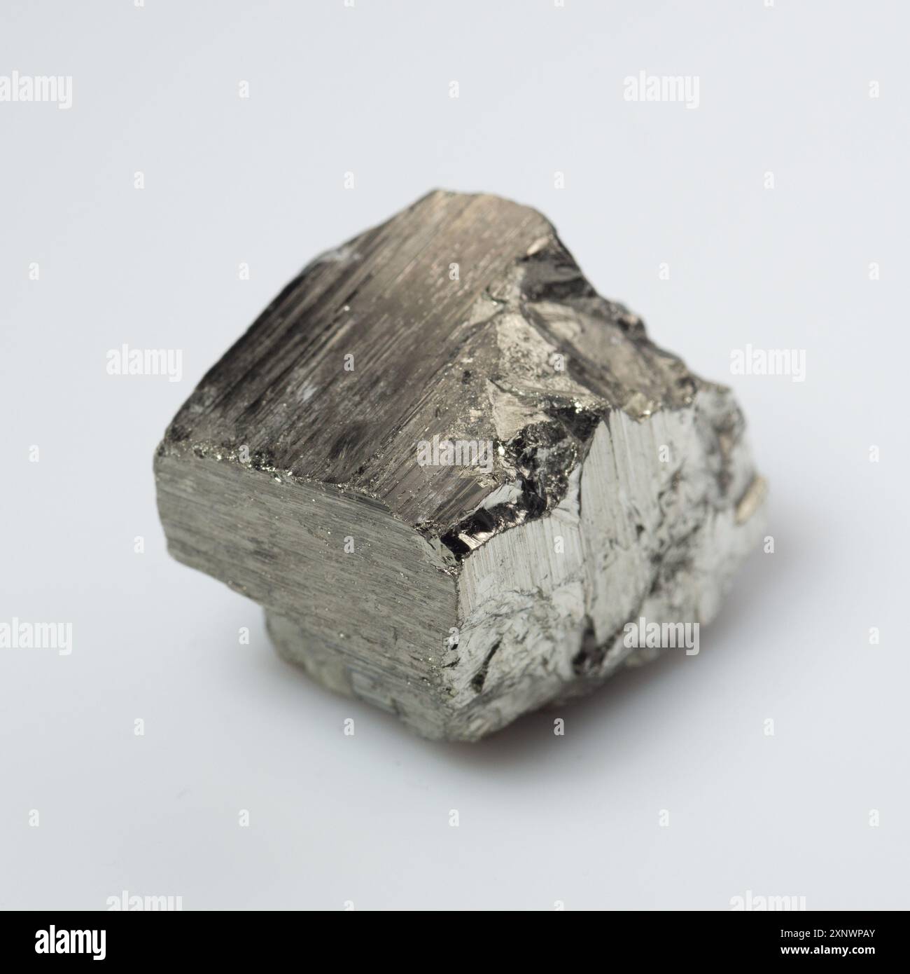 natural silver pyrite gem on white background Stock Photo - Alamy