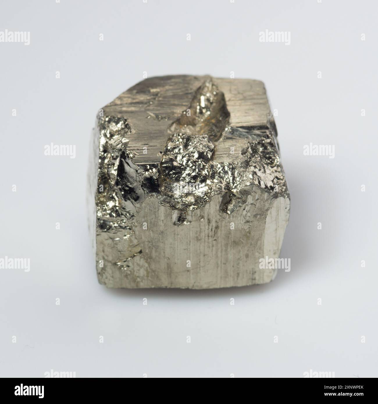 natural silver pyrite gem on white background Stock Photo - Alamy