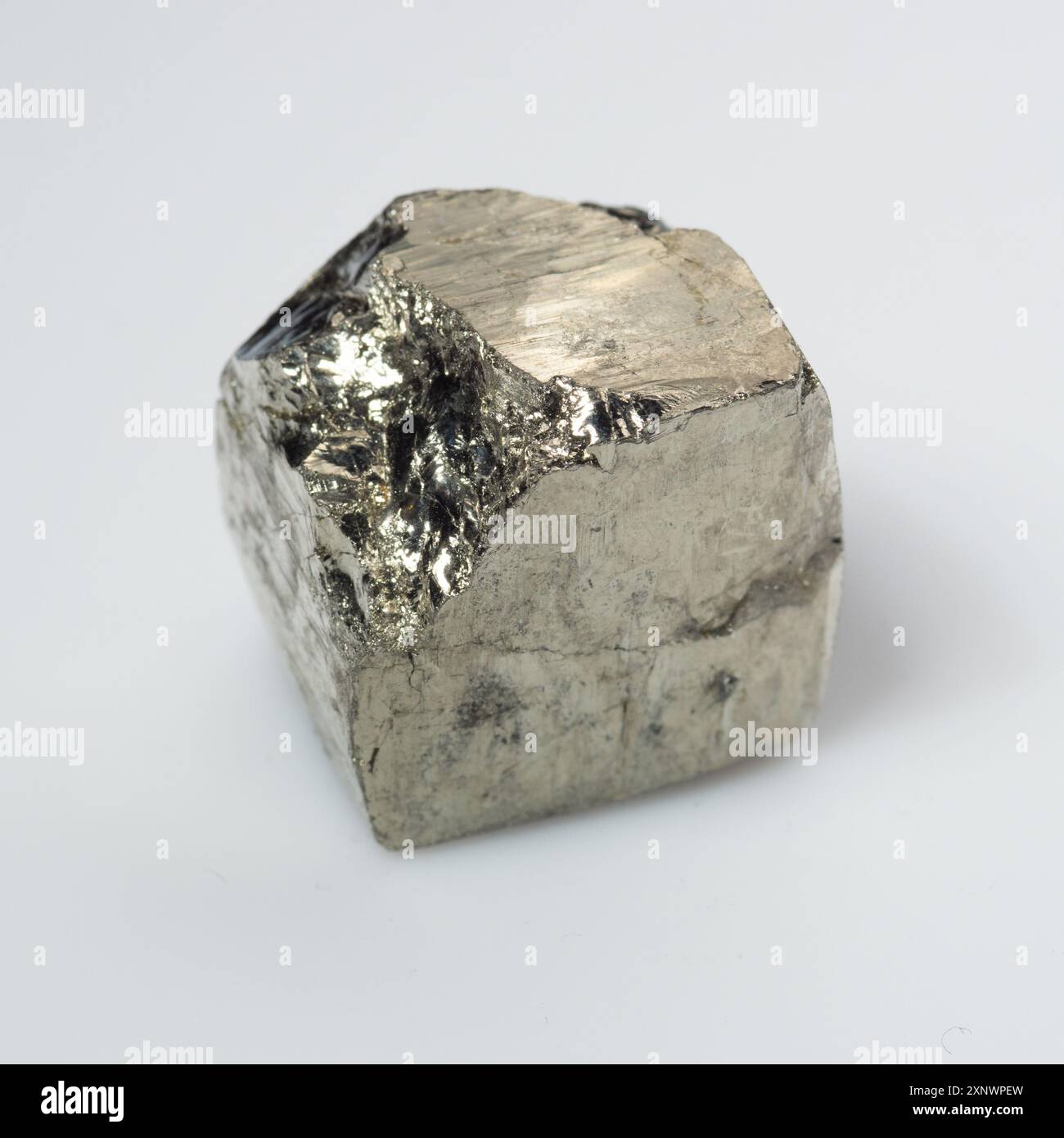 natural silver pyrite gem on white background Stock Photo - Alamy