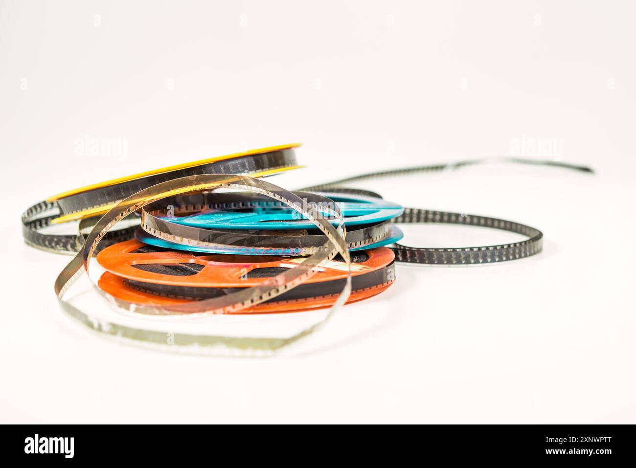 Old super 8 cinema films on white background Stock Photo - Alamy