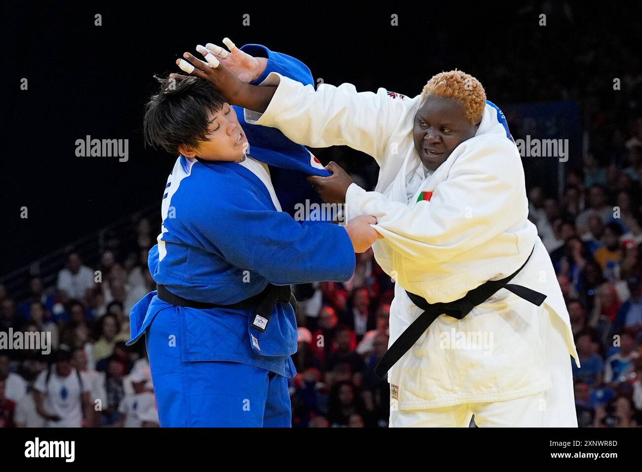 Cameroon's Richelle Anita Soppi Mbella and Japan's Akira Sone compete ...