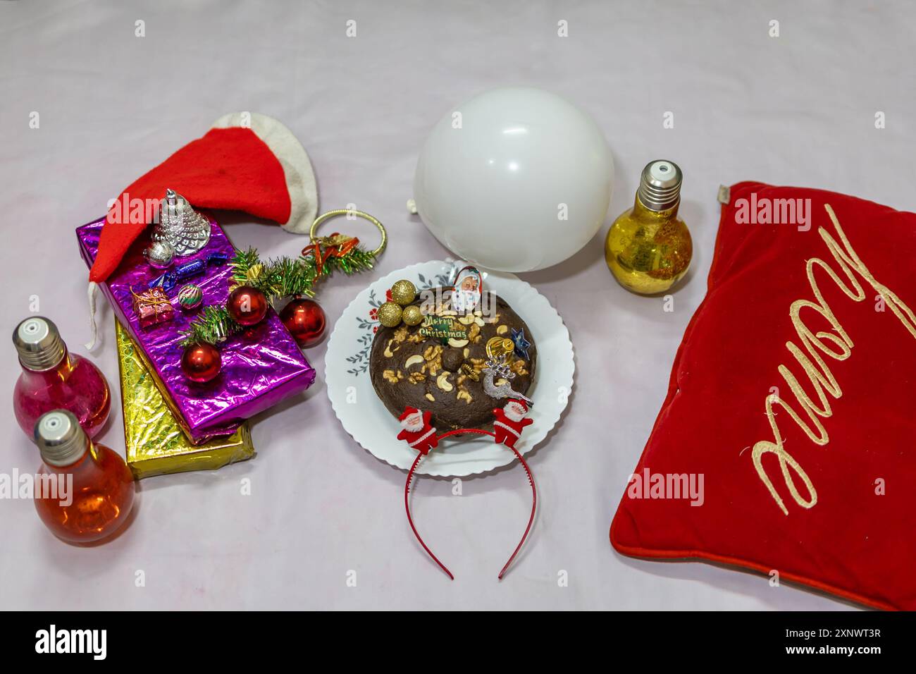 Christmas eve celebration with cake and decorative items at home at ...