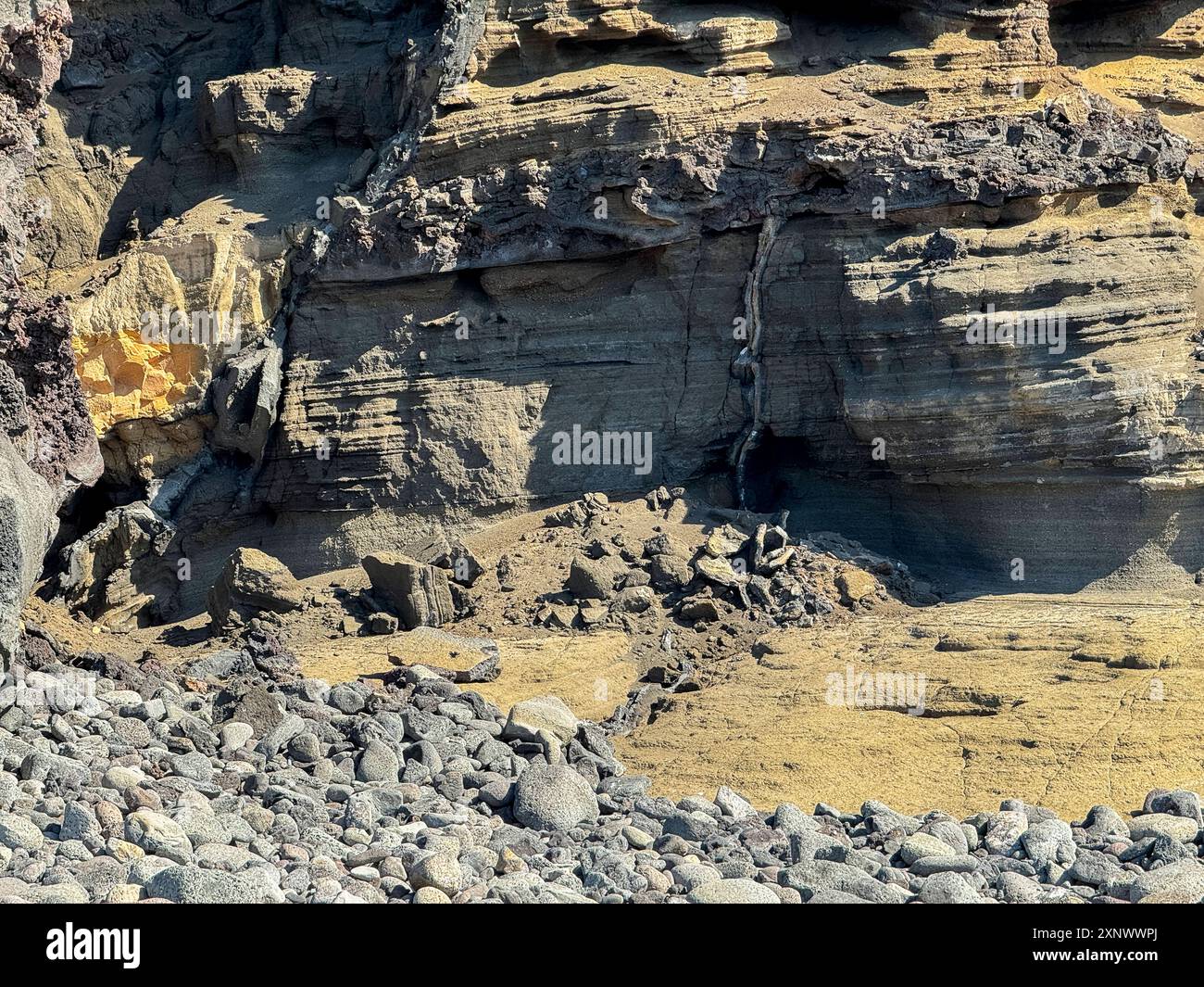 Layers of lava flows and tuff from the dormant volcano on Isla Tortuga, Baja California, Sea of ...