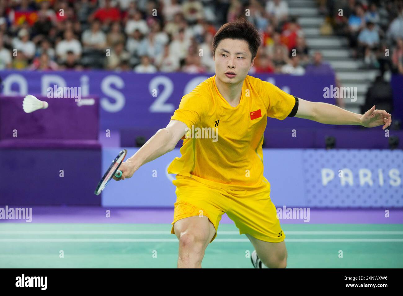 China's Yu Qi Shi plays against Thailand's Kunlavut Vitidsarn during their men's singles ...