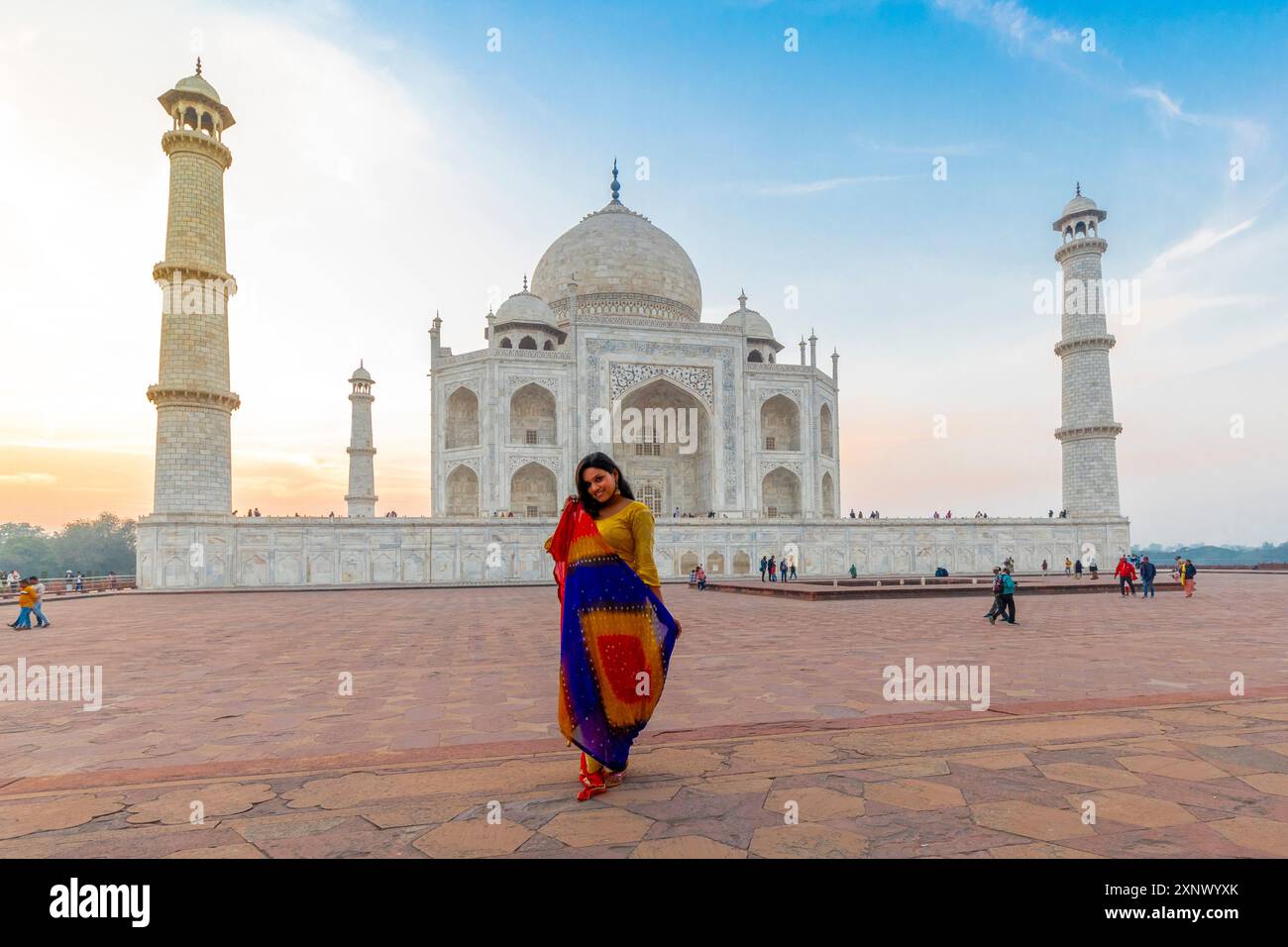 Young Indian woman in front of the Taj Mahal, UNESCO World Heritage ...