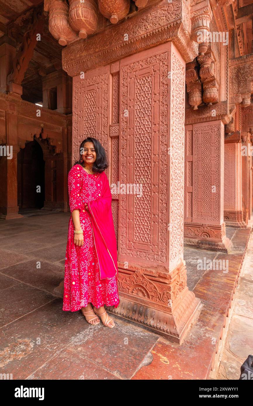 Young Indian woman in the Agra Fort (Red Fort), UNESCO World Heritage ...