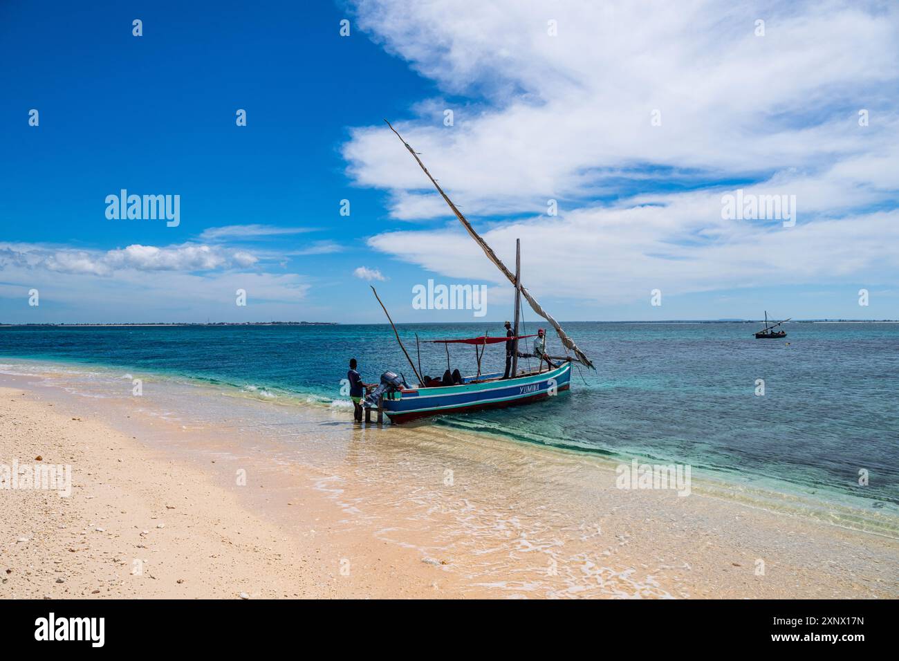 Traditional Dhow on a white sand beach, Goa island near the Island of ...